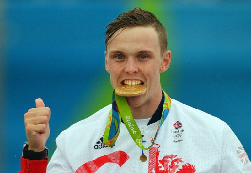 Here's the Reason Why Olympians Seem to Always Bite Their Medals - When ...