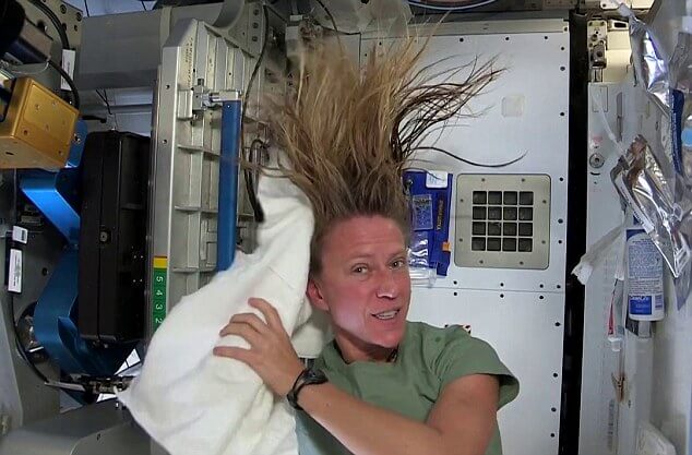 Astronaut Washing Hair In Space